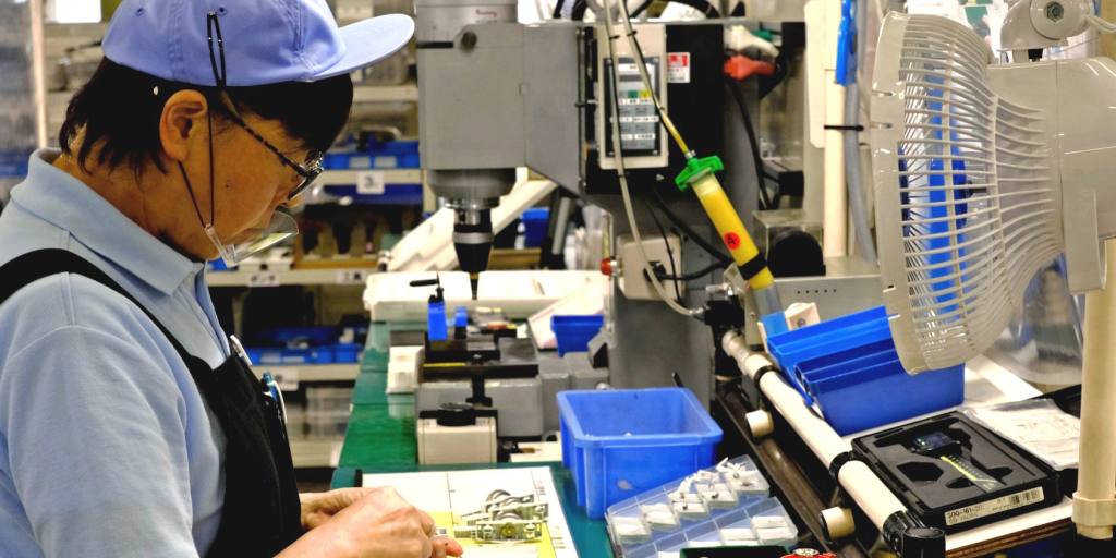 Factory swaps masks for mouth shields in Japan's summer heat - Supply ...